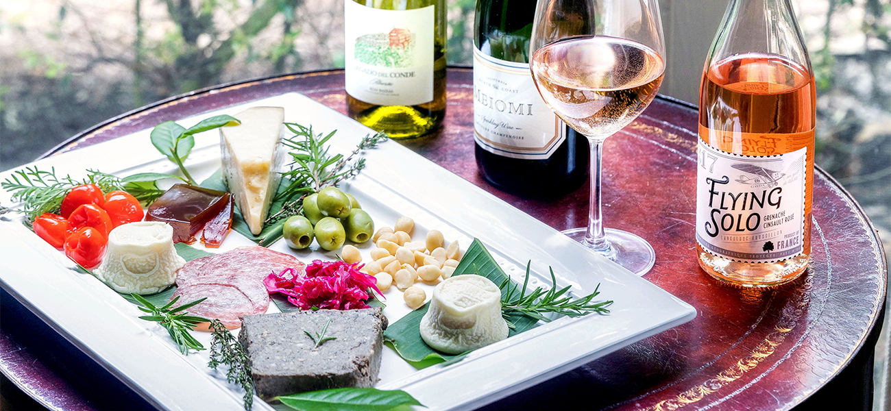 Bottles to pair with a meticulously arranged appetizer platter - [225]