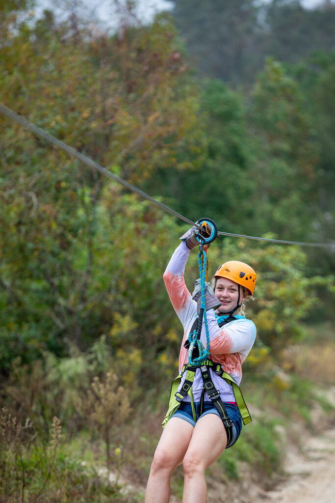 Inside Magnolia Ridge, a zip line carries riders 70 feet over the ...