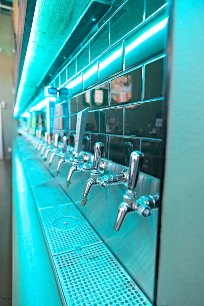 Mid Tap reopens, ditching self-pour concept in favor of a stylish redesign